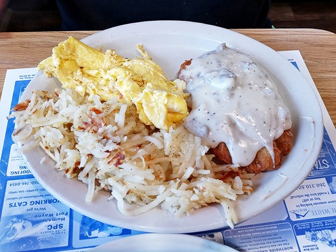 Country-fried steak smothered in gravy with hash browns that could make a potato weep with pride. Breakfast of champions.