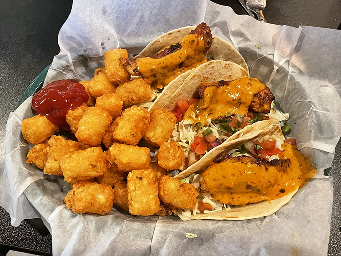 Tacos that don't need a Tuesday excuse to be enjoyed. The blackened fish and crispy tater tots create a surf-and-turf alliance of deliciousness.