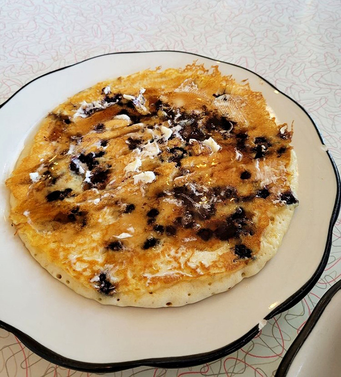 This blueberry pancake doesn't just look good&mdash;it's practically winking at you. Fluffy, golden, and studded with berries like edible sapphires.