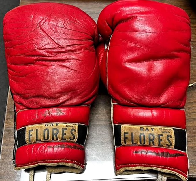 Boxing gloves with character—they've seen a few rounds and lived to tell the tale, unlike your New Year's fitness resolution.