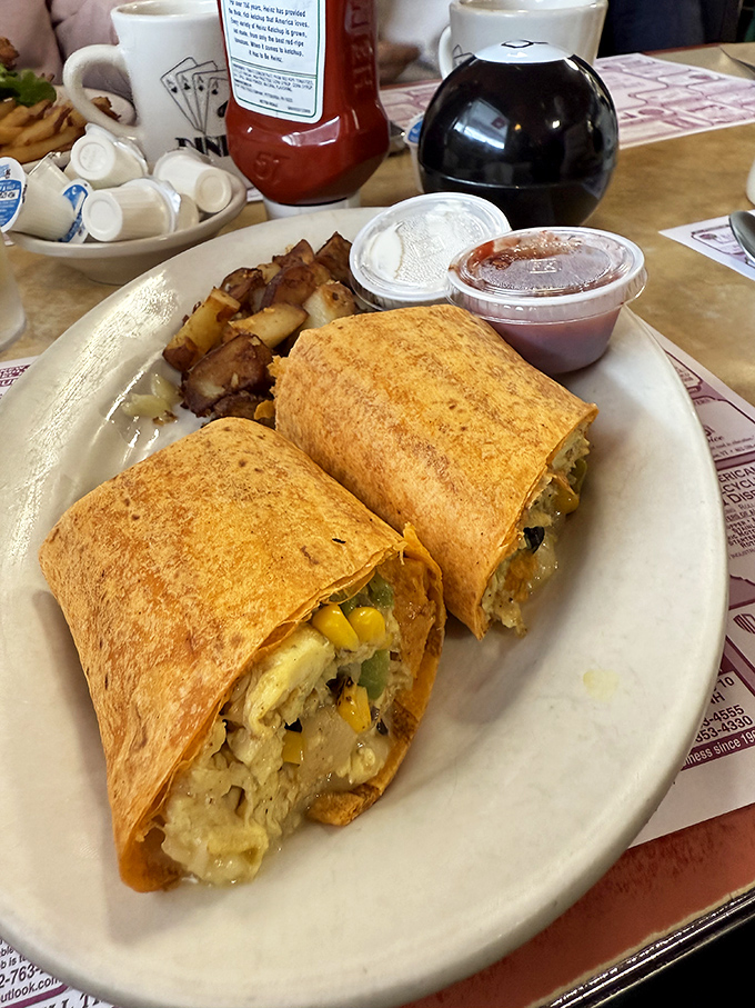 Breakfast burritos stuffed to capacity, like edible sleeping bags for eggs and cheese, ready to fuel your New Hampshire adventures.