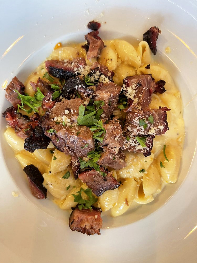 Mac and cheese that's had an existential upgrade with burnt ends. Comfort food that's gone to finishing school.