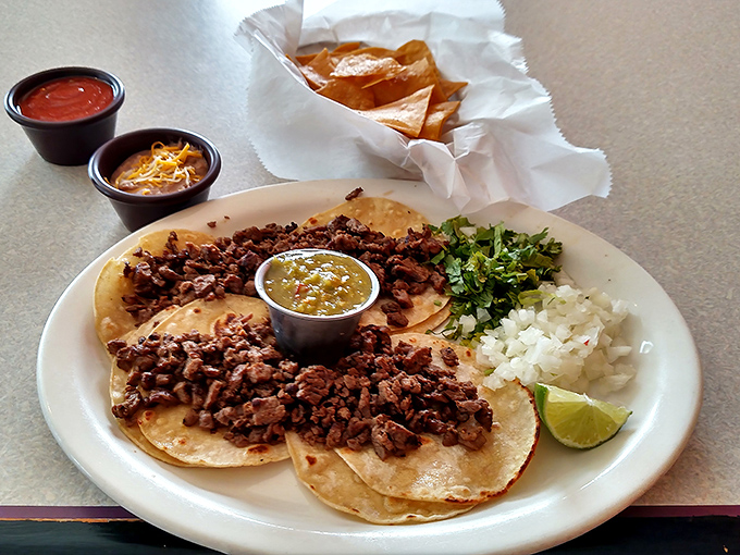 These street tacos come with all the right accessories &ndash; cilantro, onion, lime, and salsa verde &ndash; like a perfectly coordinated outfit for your taste buds.