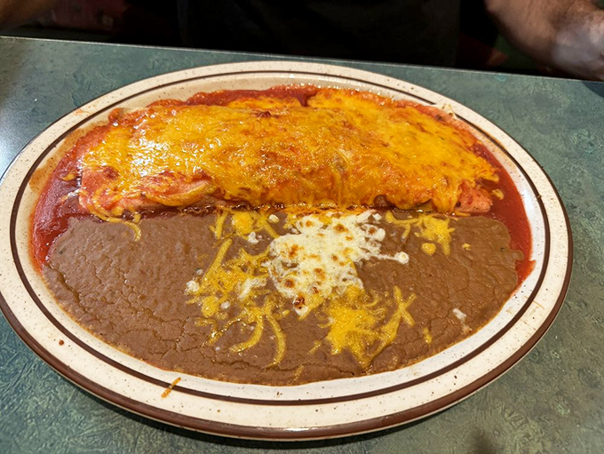 
This burrito isn't just wrapped&mdash;it's embraced by a tortilla and bathed in sauce with the tender loving care of a spa treatment for your appetite.