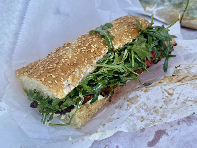 The cross-section reveals the true architecture of deliciousness. Like seeing the Grand Canyon for the first time, some sandwiches deserve a moment of silent appreciation.