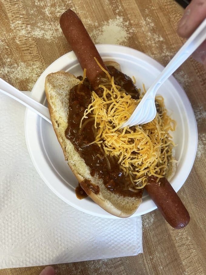 The chili cheese dog: where messy meets magnificent in a symphony of savory chili, melted cheese, and perfectly cooked wiener.