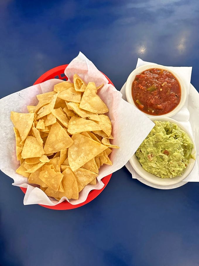 Chips so fresh they're still introducing themselves to the salsa, with guacamole playing delicious matchmaker.
