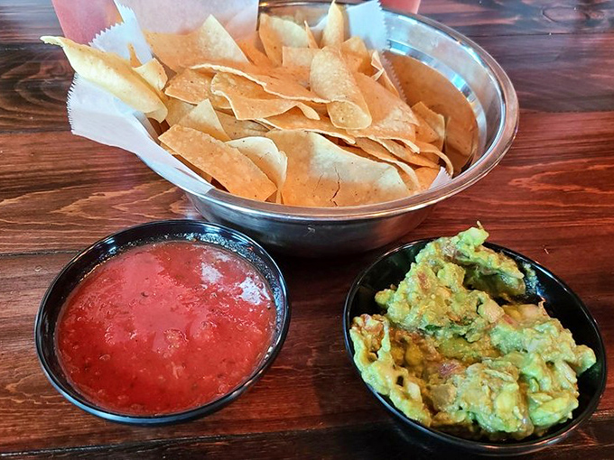 The holy trinity of Mexican appetizers: fresh chips, vibrant salsa, and guacamole so perfect it should have its own Instagram account.
