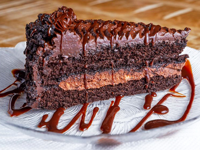 A chocolate cake so decadent it should require a permission slip. Each forkful is like hitting the dessert lottery.