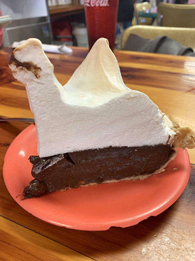 Chocolate pie with a meringue peak so impressive it deserves its own topographical map. Silky, rich, and utterly swoon-worthy.