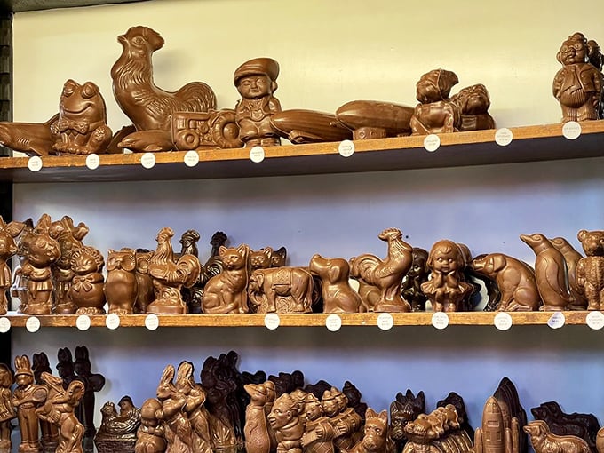 Handcrafted chocolate figurines line the shelves like an edible art gallery, tempting visitors with sweet sculptures too pretty to eat.