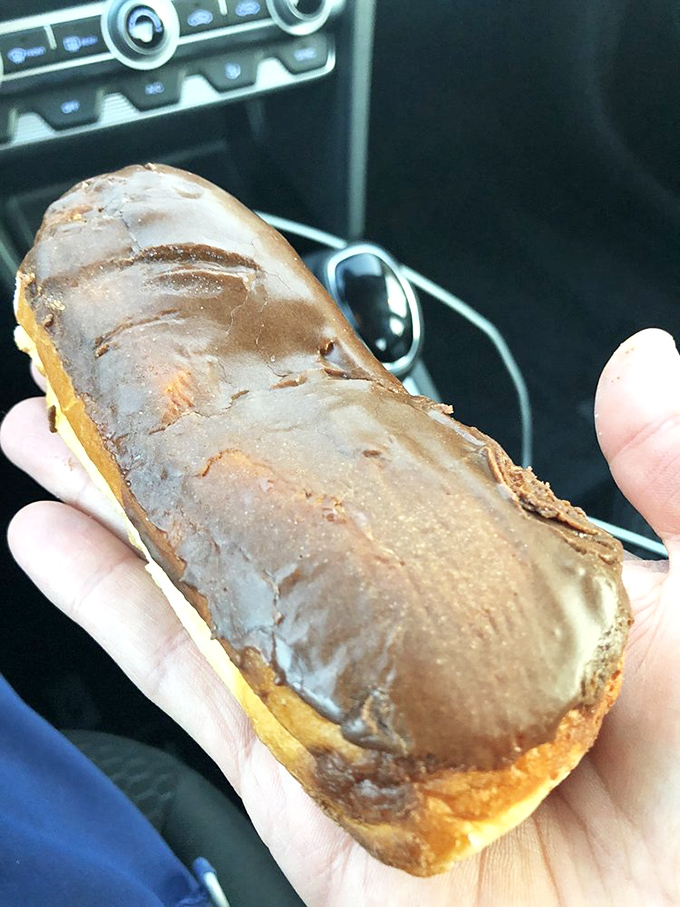 The chocolate long john&mdash;a torpedo of joy that transforms any car into a five-star dining experience. Worth every crumb on your shirt.