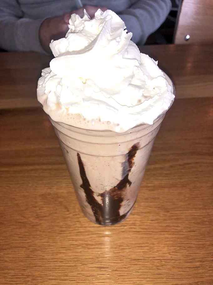 This isn't just a milkshake&mdash;it's a chocolate skyscraper with whipped cream penthouse. Drinking it counts as both dessert and upper body workout.