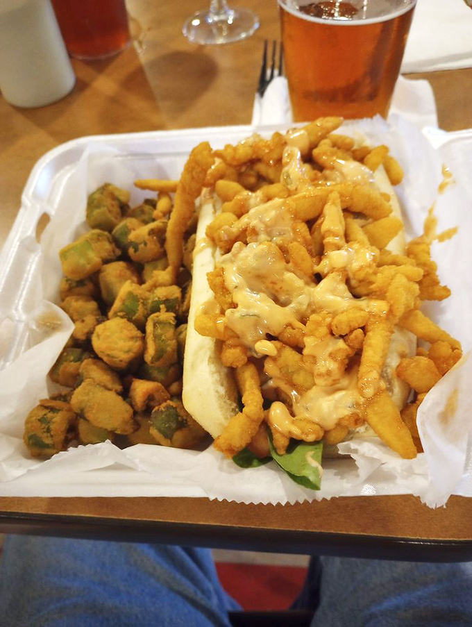 A seafood sandwich that would make Neptune himself jealous, paired with fried okra that adds a Southern twang.