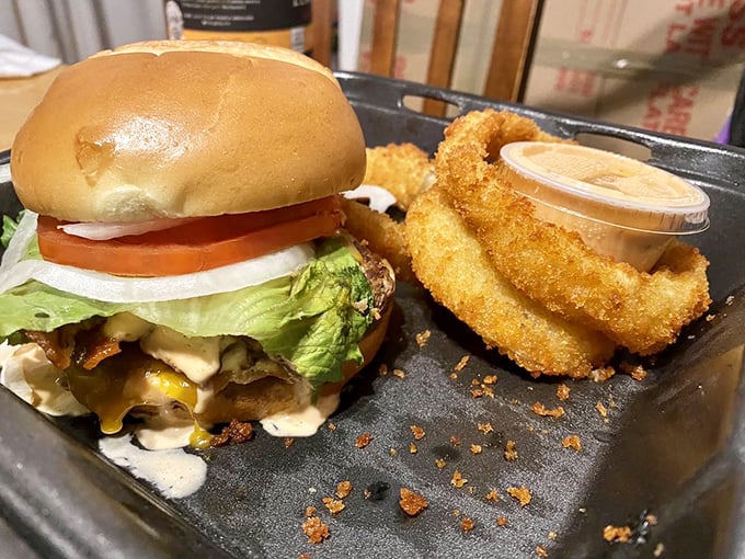The classic bacon cheeseburger with onion rings&mdash;comfort food that hugs your soul while your arteries nervously check their watches.