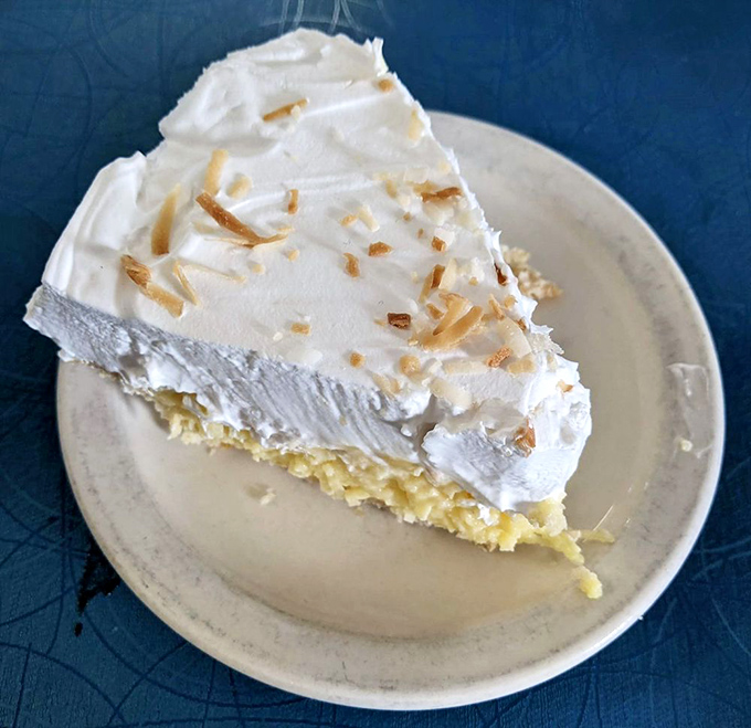 This coconut cream pie doesn't just have height—it has presence. The toasted coconut flakes are merely confetti for this celebration of sweetness.