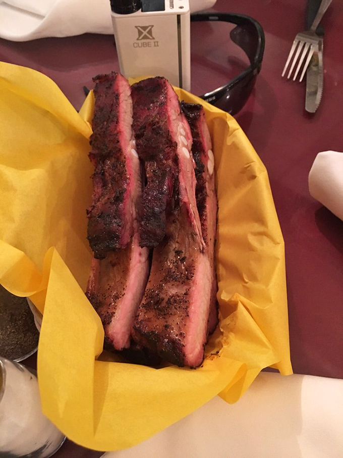 These ribs aren't just smoked, they're serenaded&mdash;nestled in yellow tissue like the precious gift to humanity they truly are.