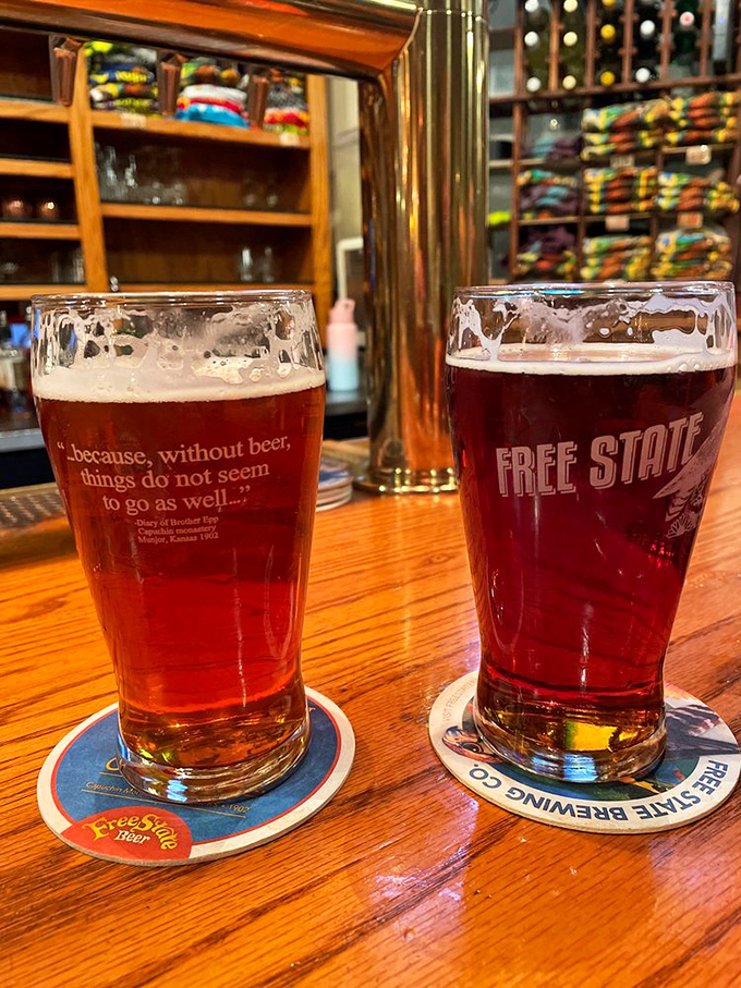 Two perfect pints catching the light like liquid amber jewels. Beer this photogenic should come with its own Instagram account.