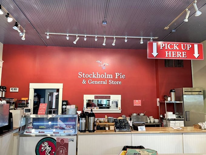 The pickup counter&mdash;where dreams come true and diets go to die. That red wall isn't just decor; it's a warning sign that resistance is futile.