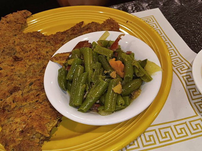 Country fried steak that's crispy outside, tender inside, with green beans that haven't forgotten their Southern roots. Comfort on a colorful plate.