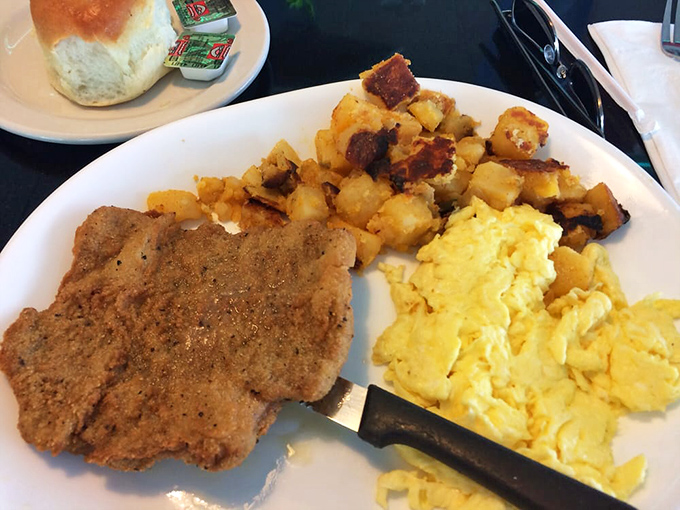 Country fried steak with eggs and home fries &ndash; the breakfast equivalent of a warm hug from your favorite aunt who never counted calories.