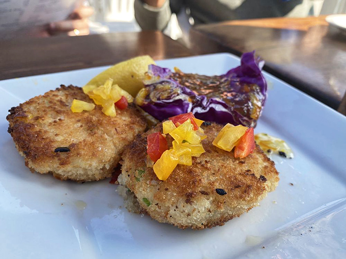 These crab cakes aren't just golden brown&mdash;they're California gold. Crispy exterior, tender interior, and topped with a confetti of colorful peppers.