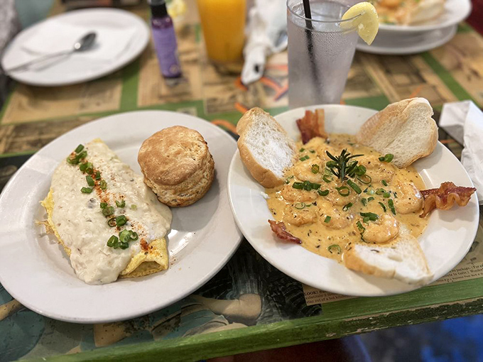 The breakfast power couple: a fluffy omelet draped in creamy sauce alongside Surrey's legendary shrimp and grits. Why choose when you can have both?