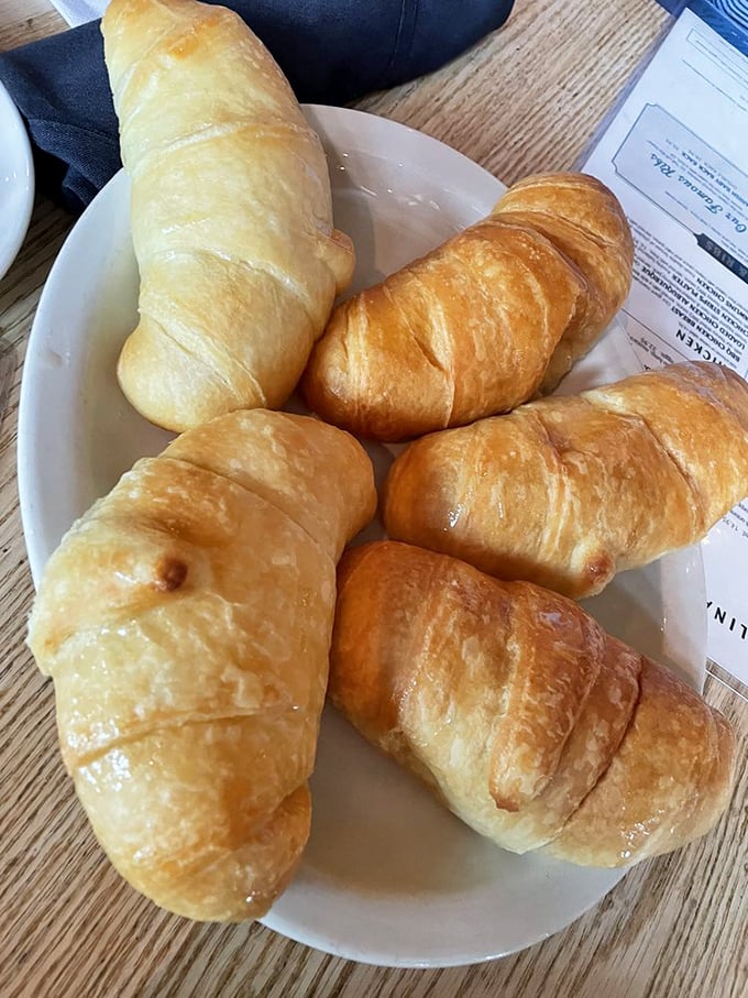 These aren't just croissants; they're butter-drenched vessels of happiness that make you question why you ever ate anything else.