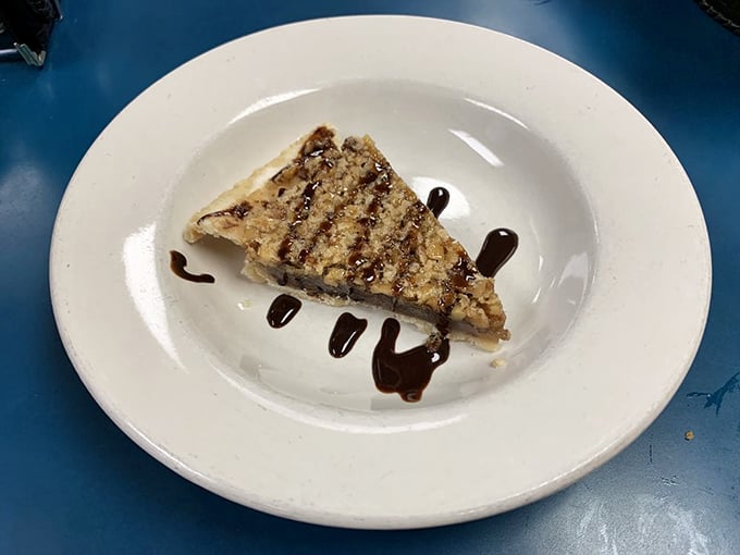 Derby Pie with chocolate drizzle &ndash; the dessert equivalent of hitting the trifecta. One bite and you'll understand why Kentuckians guard this recipe like gold.