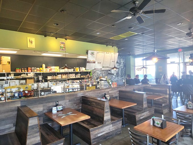 The dining area strikes that perfect balance between "cool enough to impress a date" and "comfortable enough to devour a sandwich without judgment."