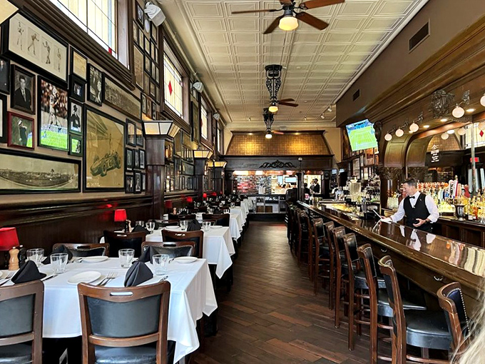 Where memories are made between bites. The classic steakhouse interior balances elegance with comfort, while framed photos tell stories of dinners past.