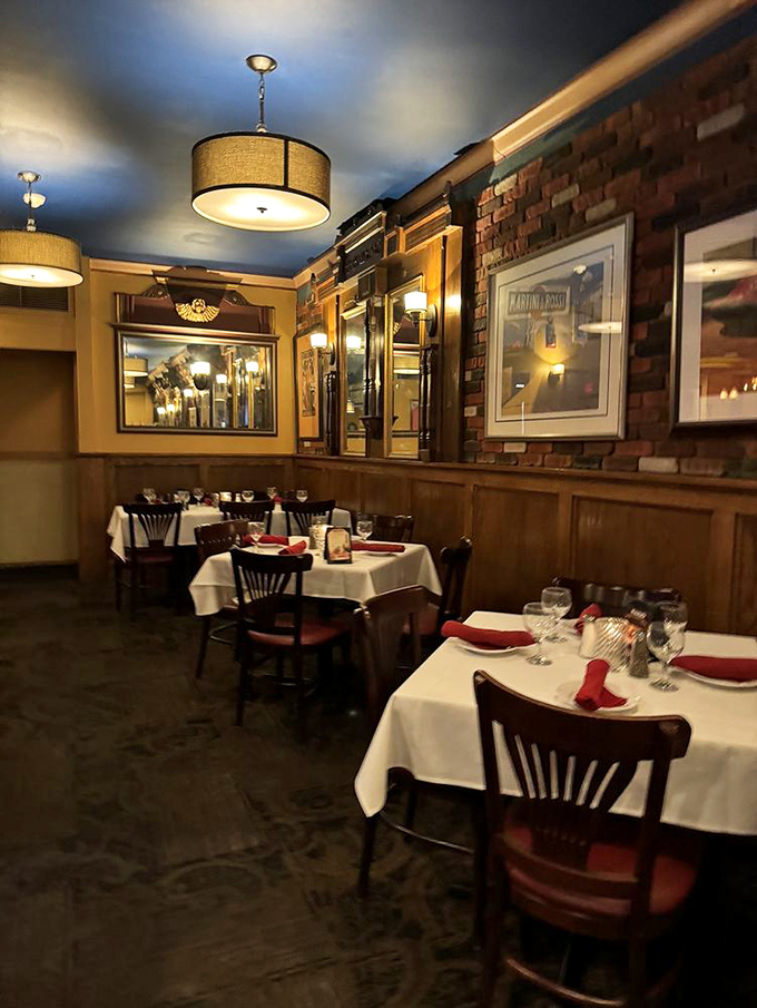 Exposed brick, drum lampshades, and white tablecloths&mdash;the dining room feels like it's been perfecting its ambiance since the Rat Pack era.