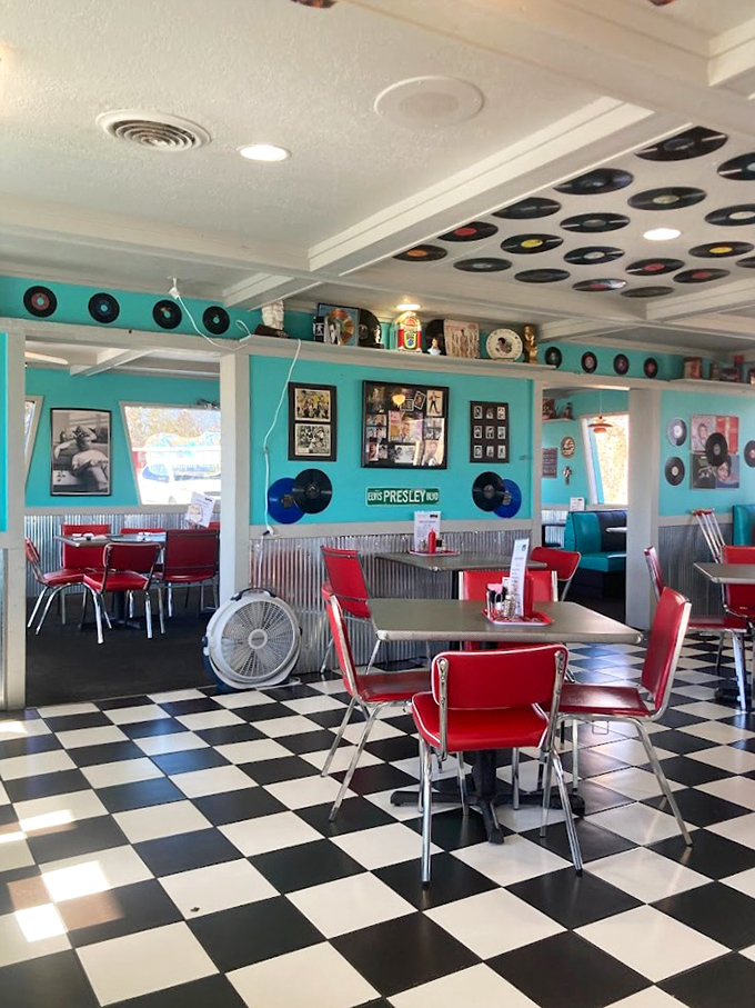 The dining area feels like a movie set where the food is actually delicious. Those vinyl records aren't just decor&mdash;they're watching over your meal.