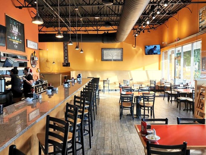 A dining room where breakfast dreams come true. The kind of place where strangers become friends over shared appreciation of perfectly cooked eggs.