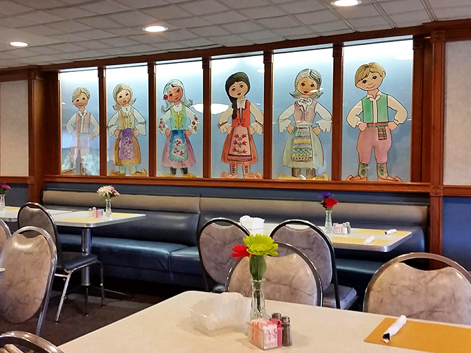 The dining area's folk art windows celebrate the Serbian heritage behind Barberton's famous chicken. Cultural immersion with your comfort food.