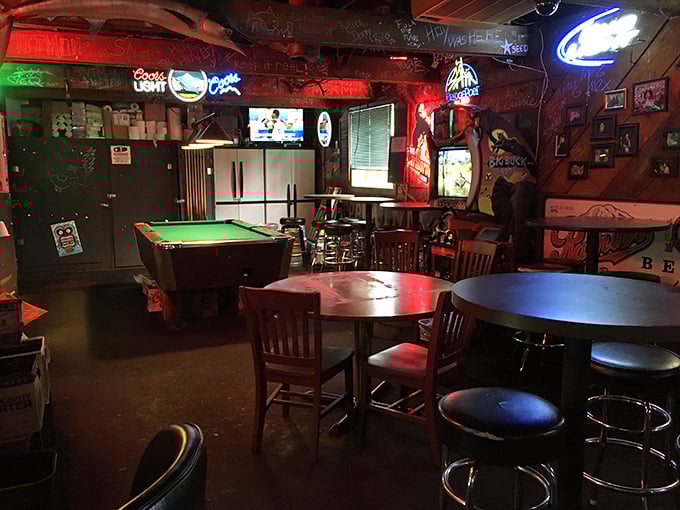 Christmas lights twinkle year-round in this wood-paneled wonderland where strangers become friends while waiting for chicken worth writing home about.