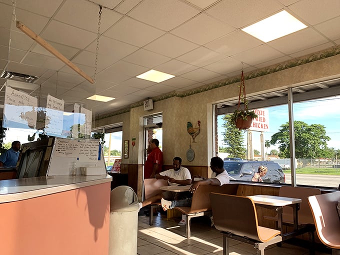 Sunlight streams through windows onto simple booths where farmers, families, and food pilgrims gather in pursuit of fried perfection.