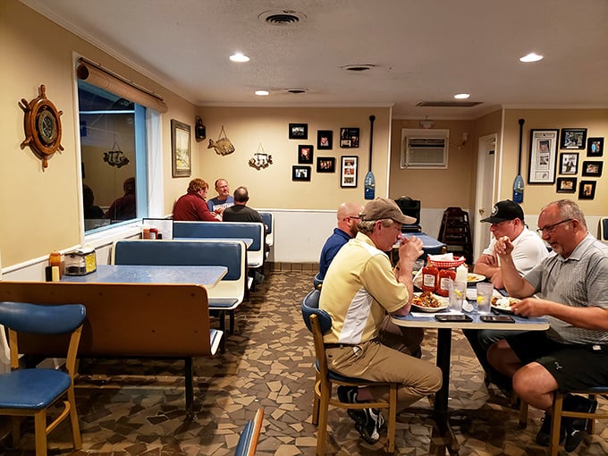 Blue booths, nautical decor, and the promise of seafood dreams fulfilled. This dining room has hosted more happy meals than any fast food chain.