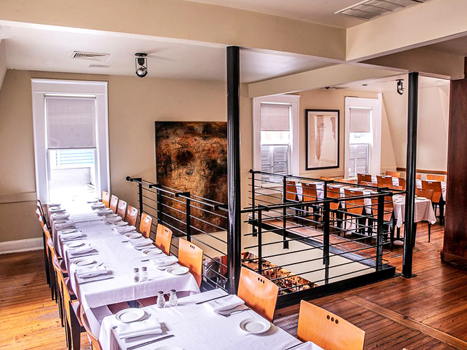 The multi-level dining room creates intimate pockets within the bustle&mdash;somehow both cozy and sophisticated at once.