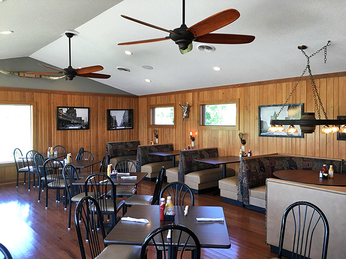 Ceiling fans lazily spin above wood-paneled walls and comfortable booths. The kind of place where calories don't count and time slows down.