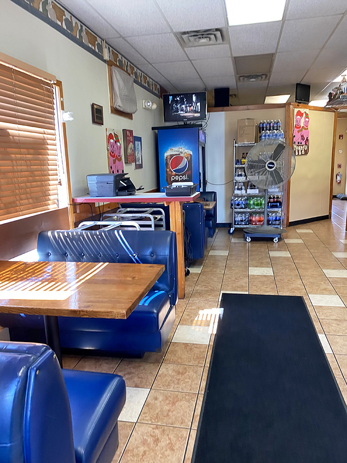 Blue vinyl booths and wood-grain tables&mdash;the classic barbecue joint uniform. No designer needed to create this timeless space where the food does the talking.