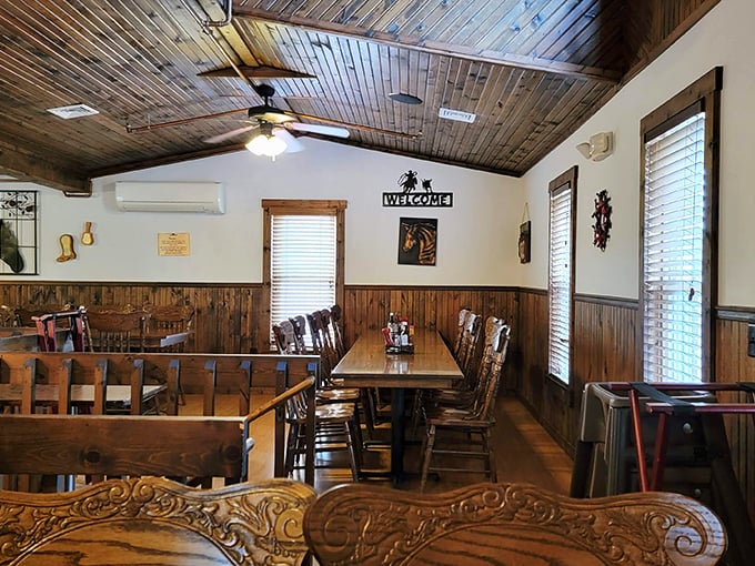 The dining room feels like the cabin your wealthy uncle built—all wood everything, with a "Welcome" sign that means business.