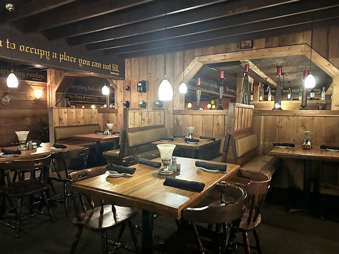 The dining room's wooden booths and pendant lighting create Indiana's coziest corner for contemplating the deeper questions, like "filet or ribeye?"