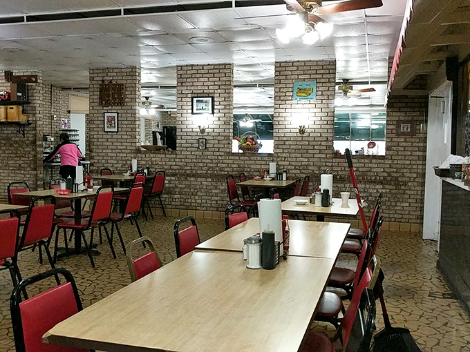 Brick walls and long tables create the perfect canvas for breakfast symphonies. No mood lighting needed when the food shines this bright.