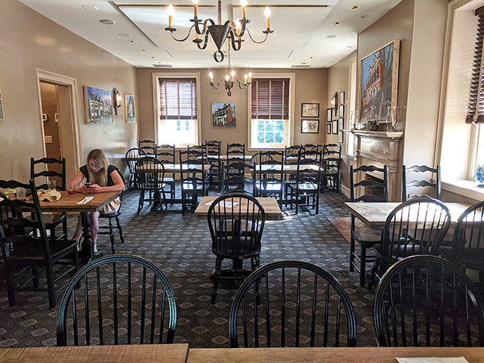 A dining room where you half-expect to see Benjamin Franklin scribbling notes in the corner while enjoying a hearty meal.