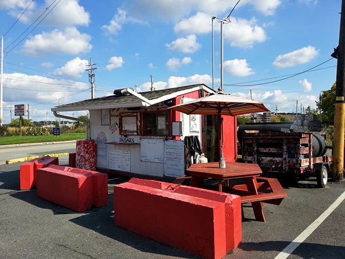 No white tablecloths here, just red concrete blocks and picnic tables—because when the food's this good, ambiance is whatever you make it.