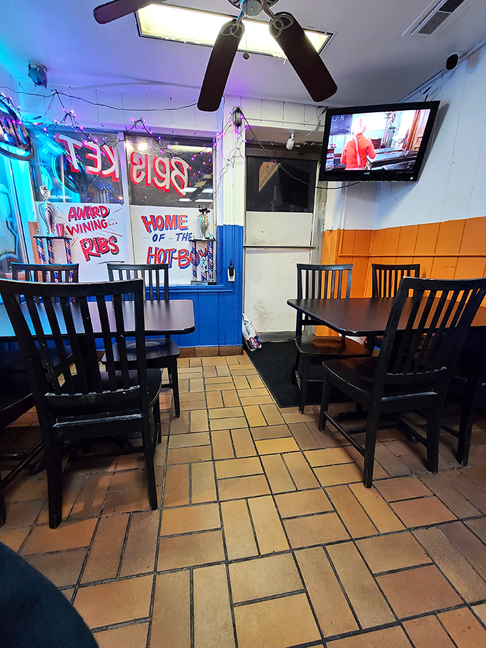 The dining area says "focus on the food," with its no-nonsense setup and window proudly declaring "Award Winning Ribs." They're not lying.