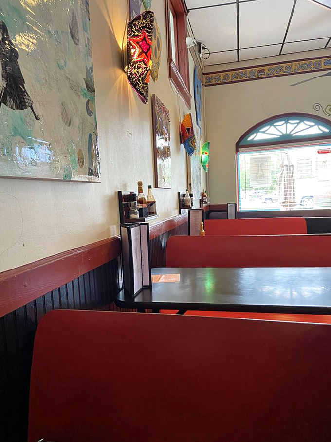 Red booths that have cradled countless conversations and food epiphanies. The kind of place where strangers become friends over shared guacamole.