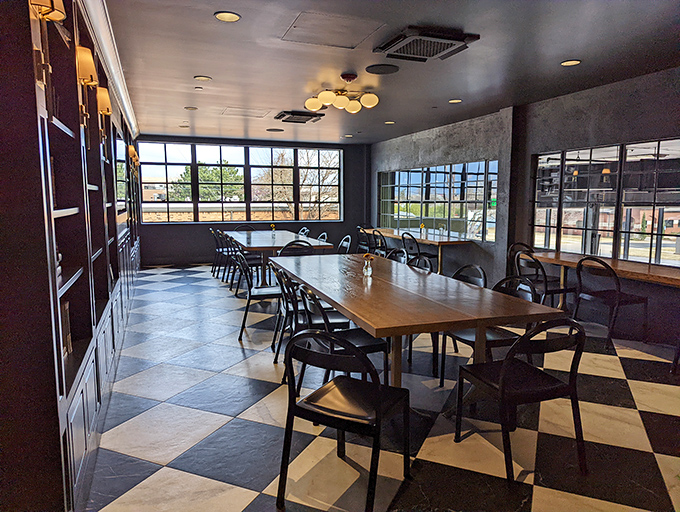 Chess players would approve of this black-and-white tiled dining area where breakfast strategy is planned and executed with delicious precision.