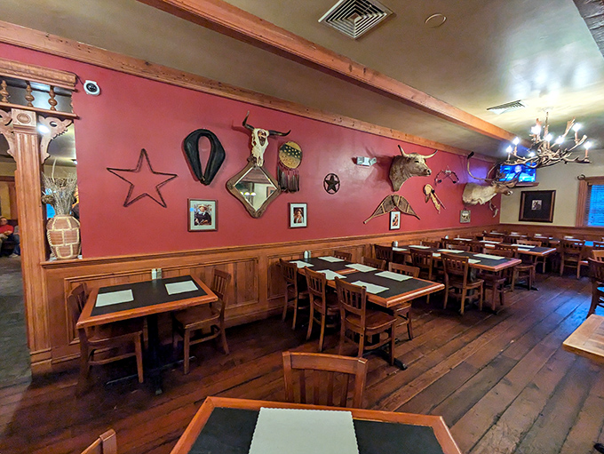 Red walls adorned with Western memorabilia create the perfect backdrop for meat-fueled memories. Cowboy chic without trying too hard.